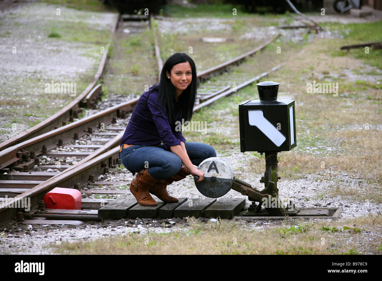 Young woman and switch Stock Photo - Alamy
