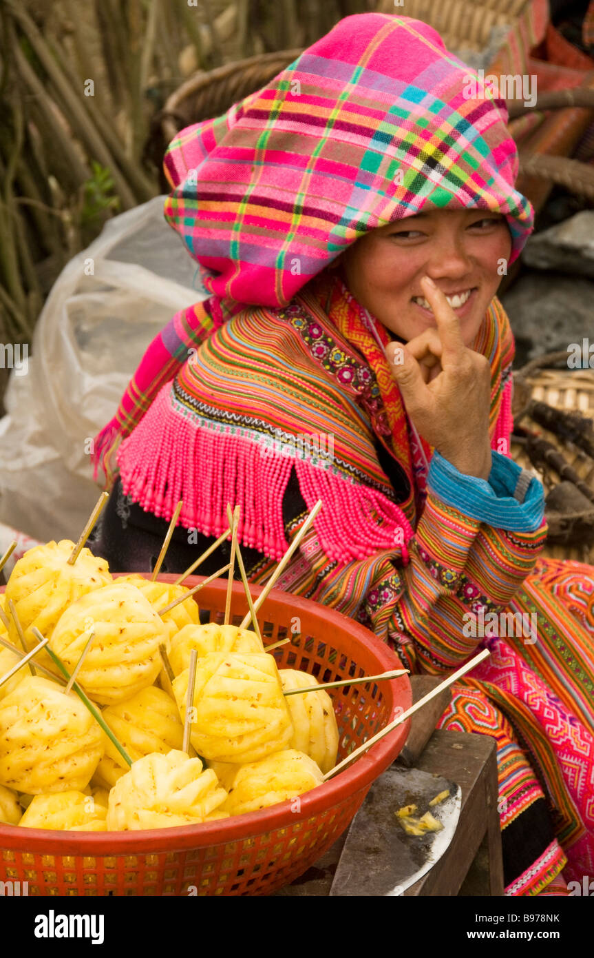 colorful Flower Hmong woman selling pineapples in the market in Cau Son ... colorful Flower Hmong woman selling pineapples in the market in Cau Son ...
