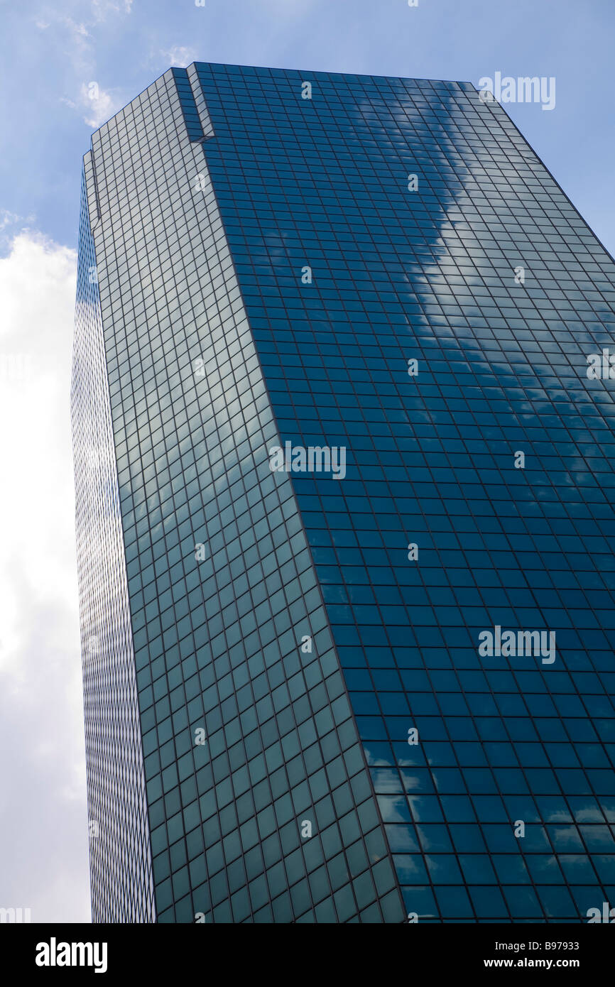 urban view at modern glass building with reflection on blue sky Stock ...