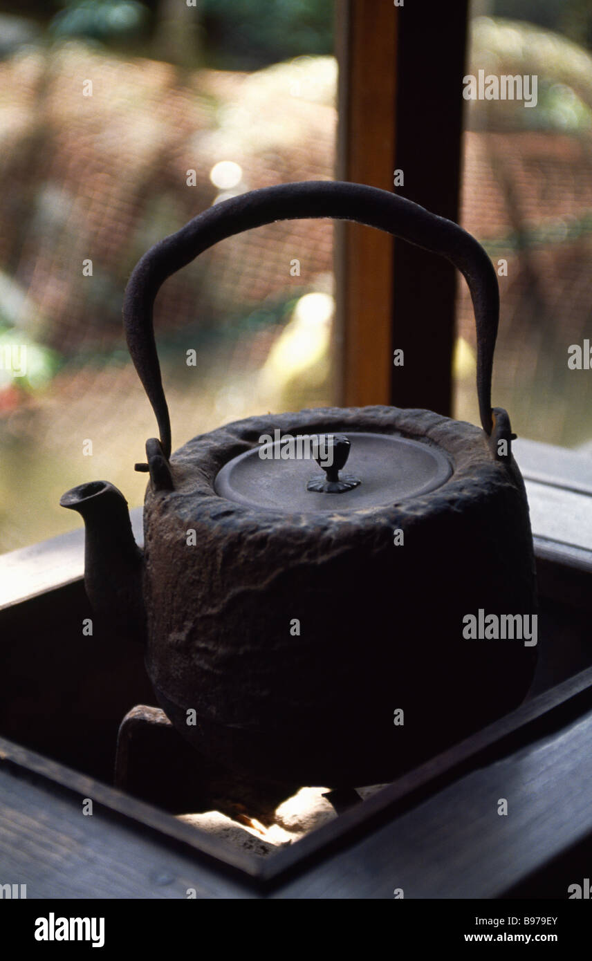 Iron kettle and fireplace Stock Photo - Alamy