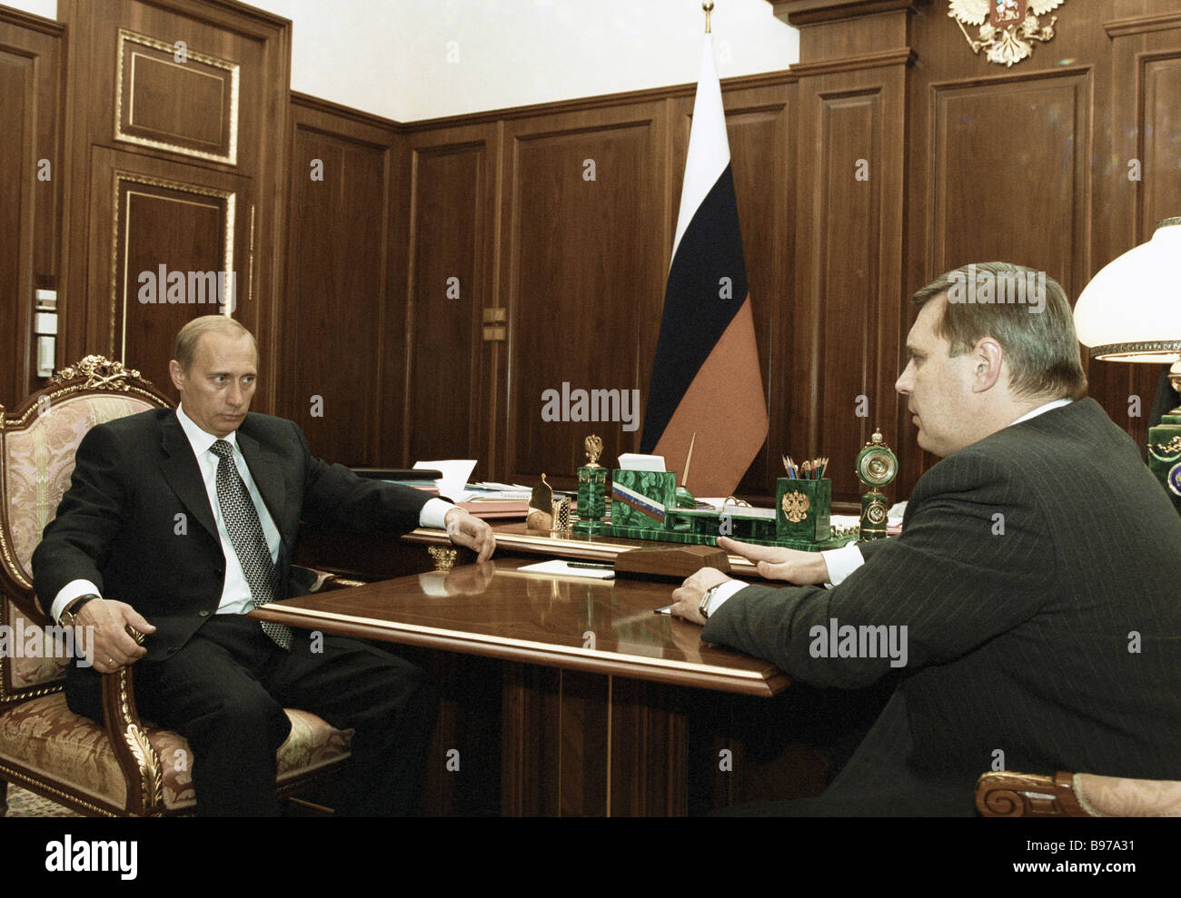 Russian President Vladimir Putin left and Prime Minister Mikhail ...