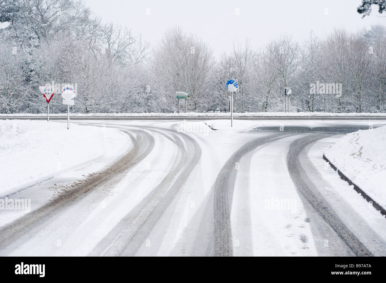 Road signs in snow junction hi-res stock photography and images - Alamy