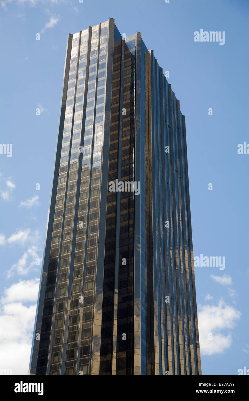 urban view at modern glass building with reflection on blue sky Stock ...