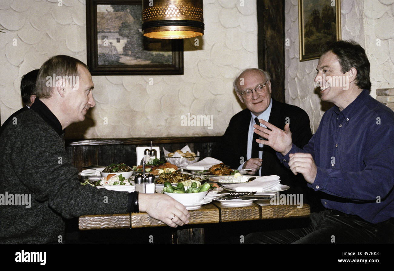 Russian President Vladimir Putin left and Tony Blair right in the beer ...