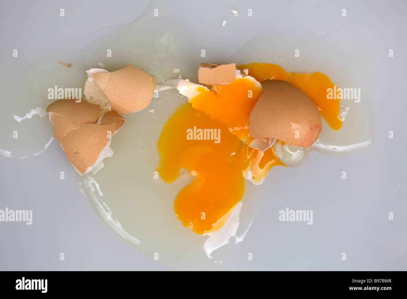 A chicken egg is broken Stock Photo - Alamy