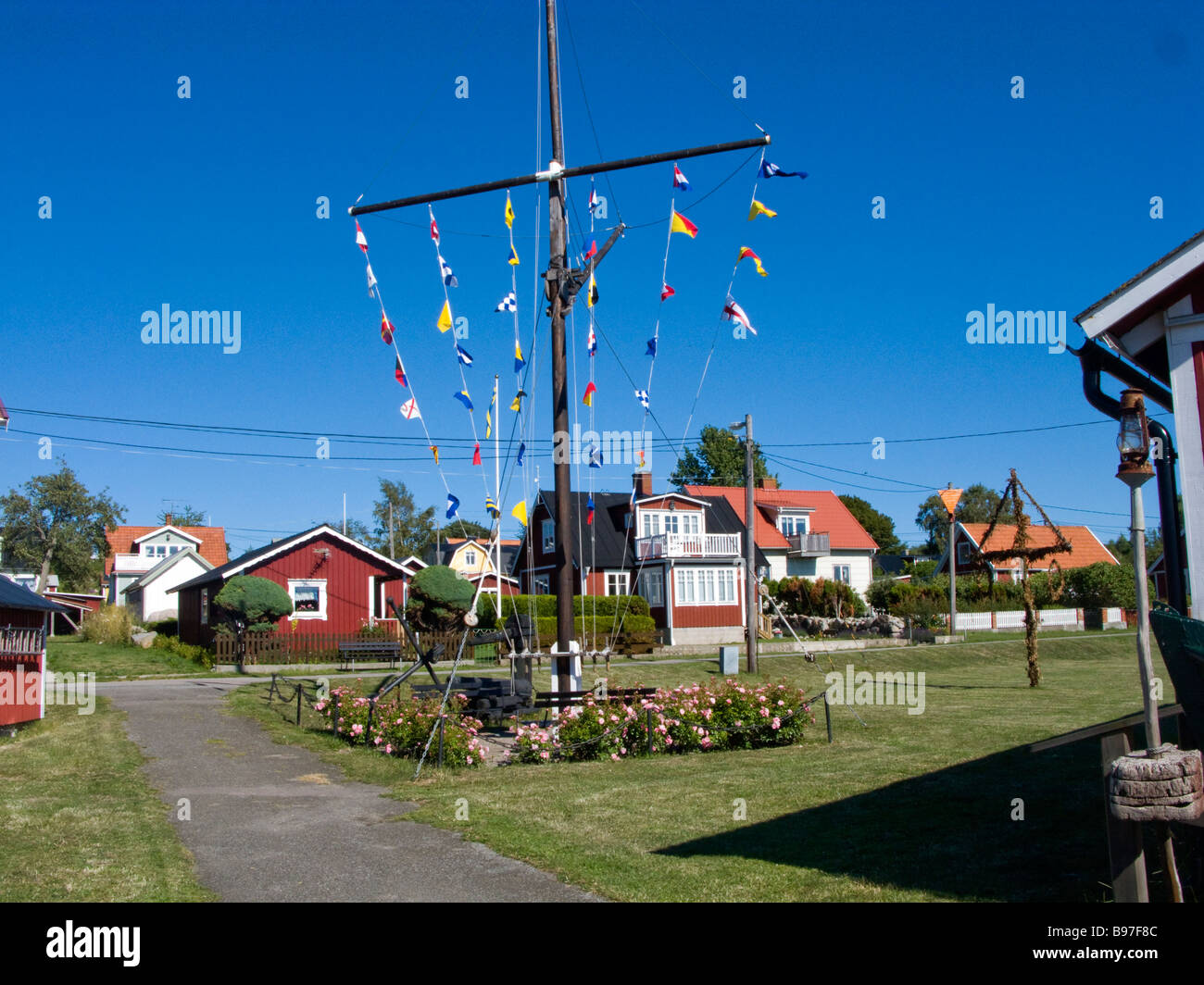 Pole with flags Stock Photo - Alamy