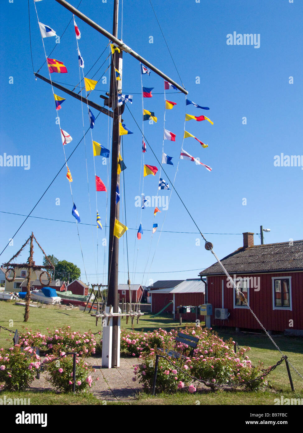 Pole with flags Stock Photo - Alamy