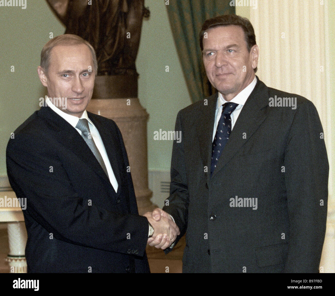 Russian President Vladimir Putin left and German Chancellor Gerhardt ...