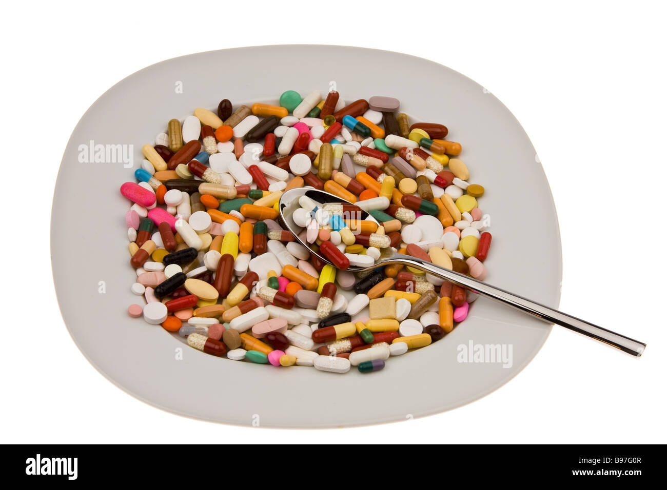 Many tablets on a plate Stock Photo - Alamy