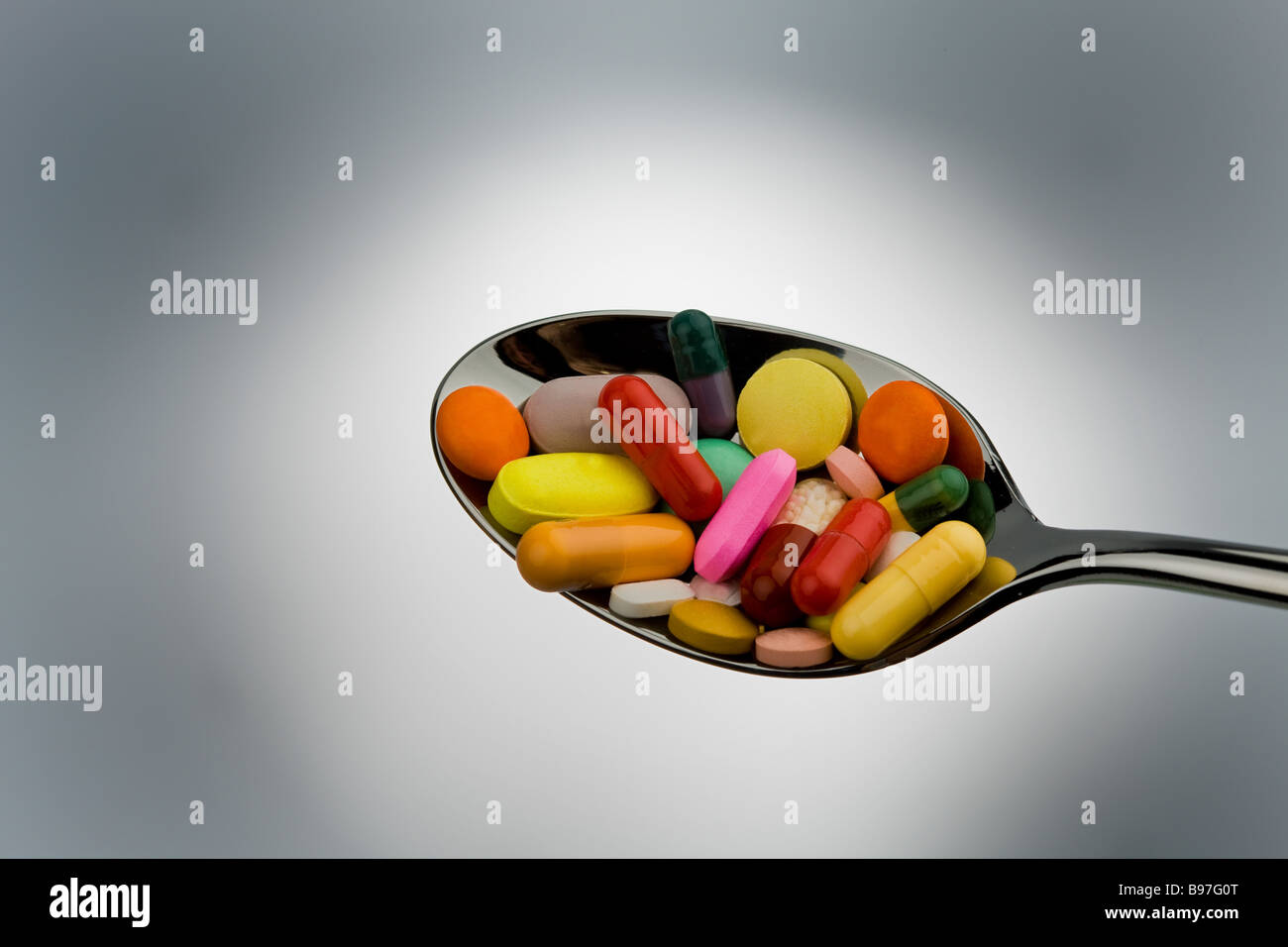 Medical dosage spoons hi-res stock photography and images - Alamy