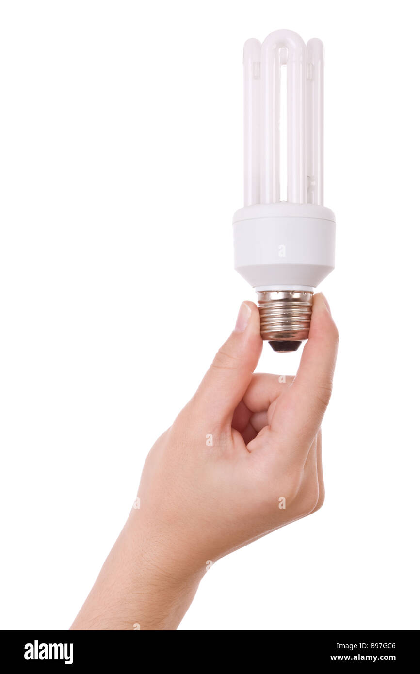Hand holding compact fluorescent light bulb isolated on white Stock ...