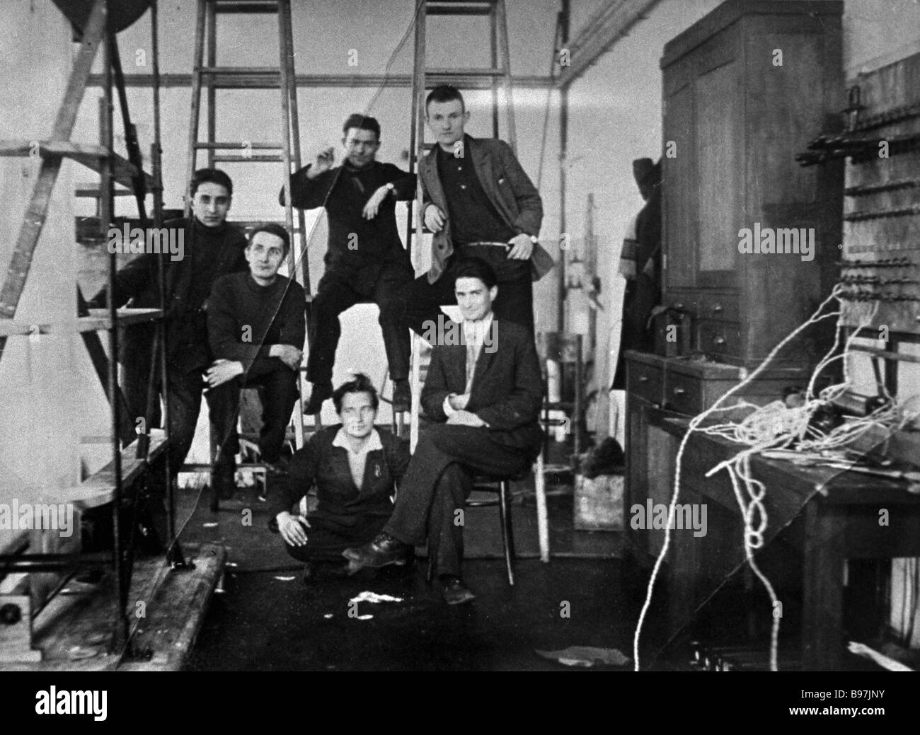 Soviet physicist Igor Kurchatov sitting right with staffers of the ...