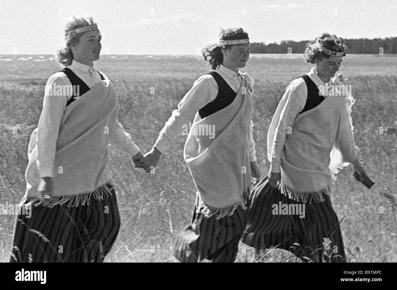 Lettish girls in national clothes at a folk holiday Stock Photo - Alamy