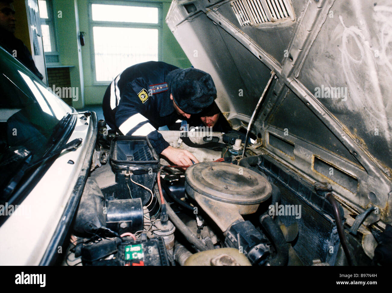 A traffic policeman inspects a car Stock Photo - Alamy