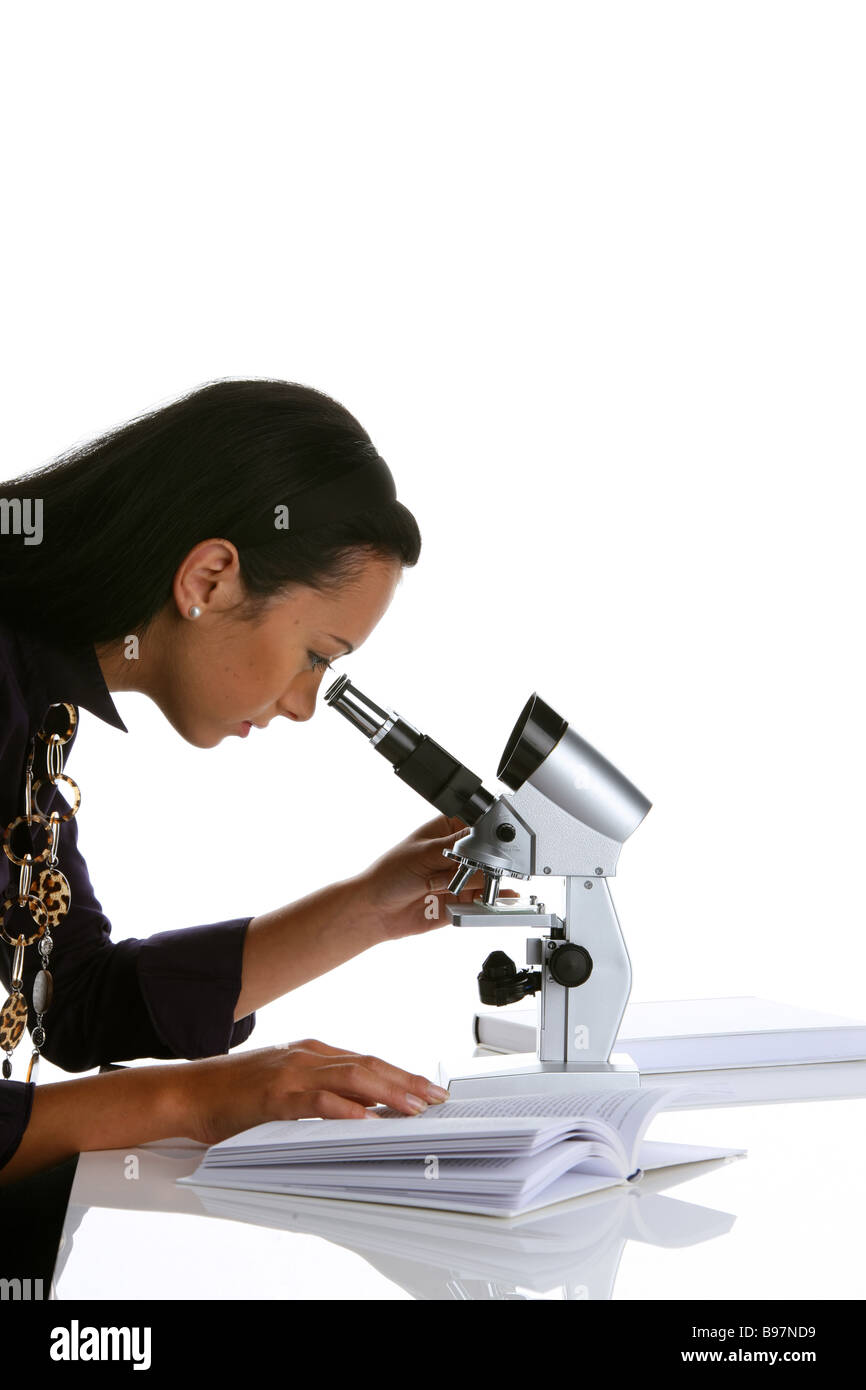 Young woman with a microscope Stock Photo - Alamy
