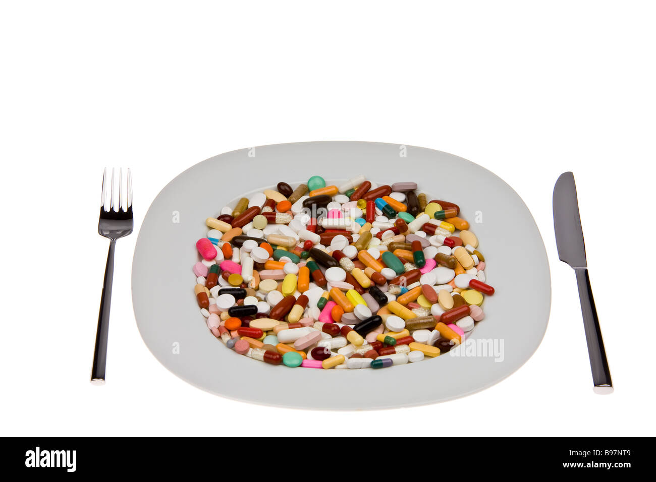 Many tablets on a plate Stock Photo - Alamy