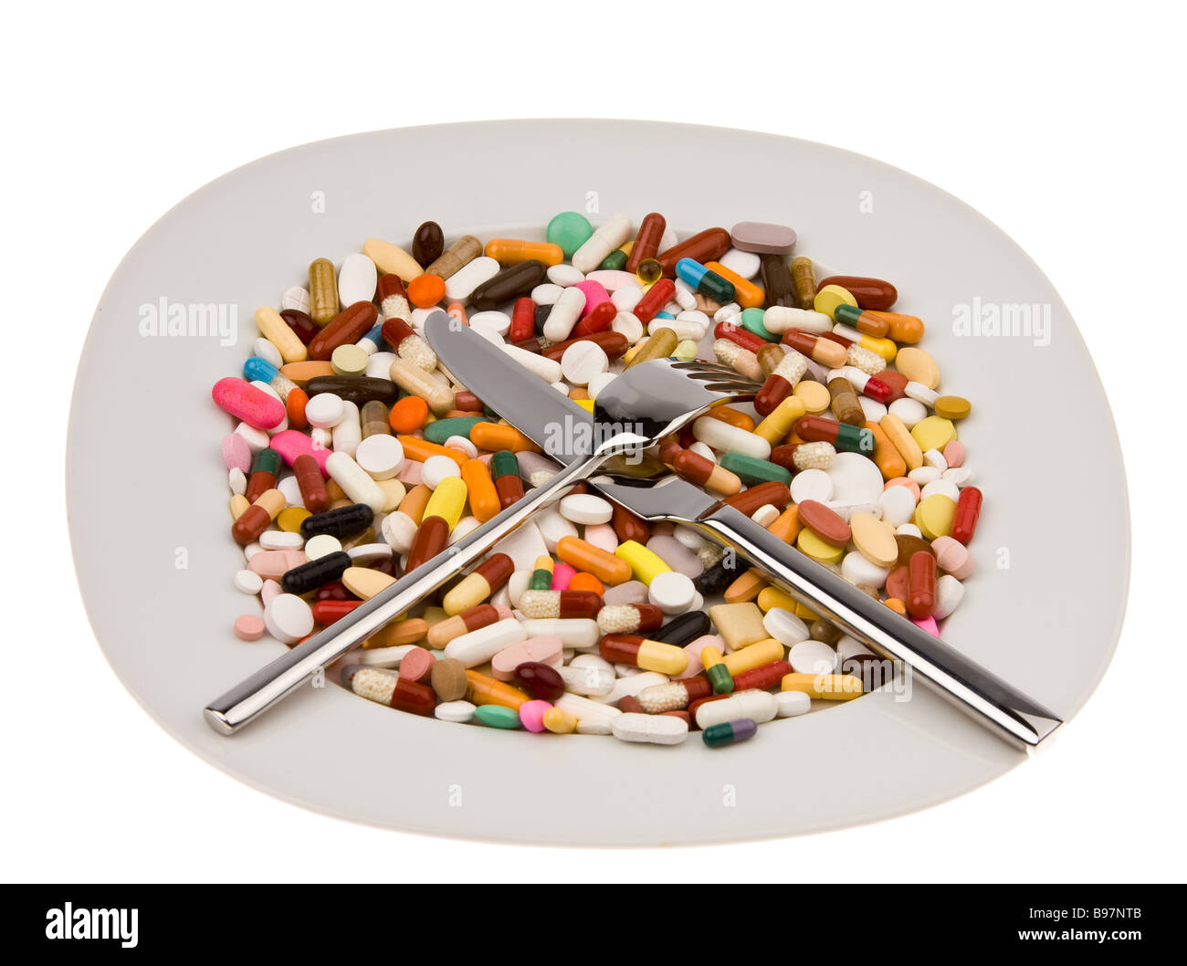 Many tablets on a plate Stock Photo - Alamy