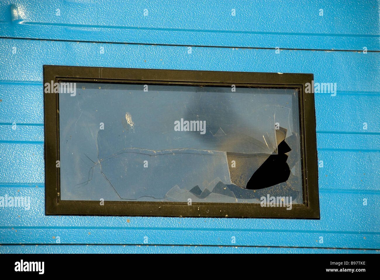 Broken window in industrial building Stock Photo - Alamy