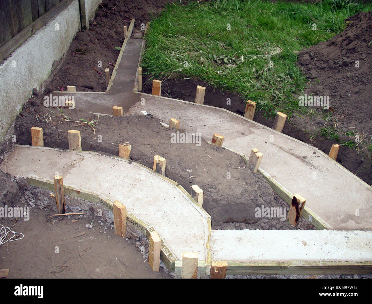 Picture shows the footings of a small wall in a front garden Stock ...