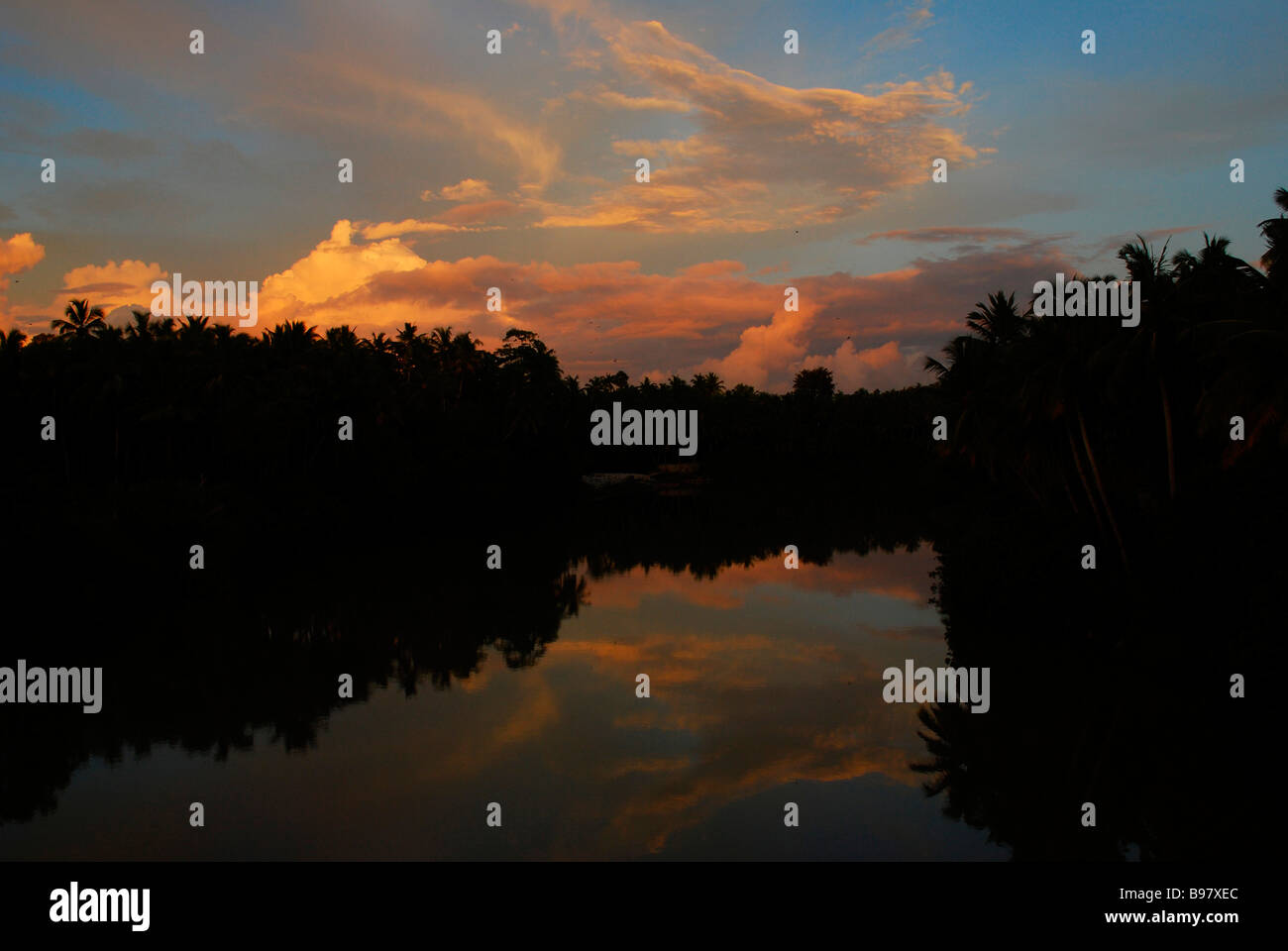 sunset from a river,kerala,india Stock Photo - Alamy