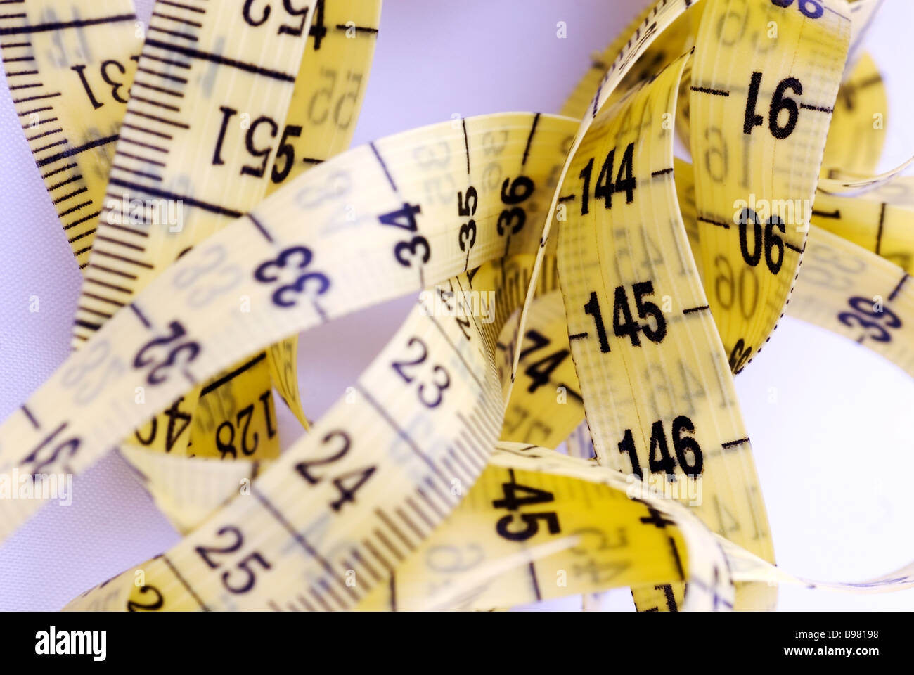 Measuring tape isolated mess hi-res stock photography and images - Alamy