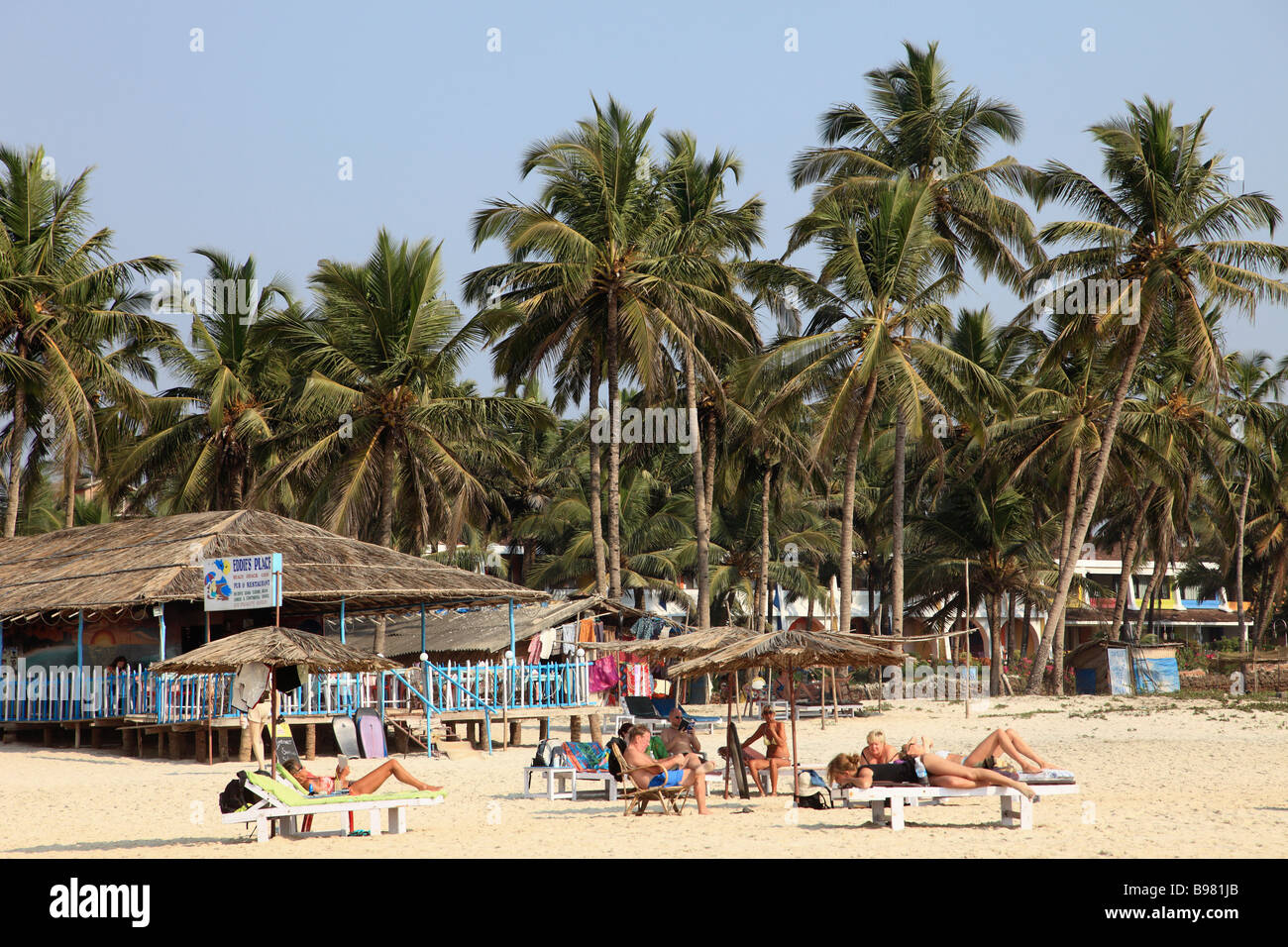 India Goa Colva beach tourists palms seaside restaurant Stock Photo - Alamy