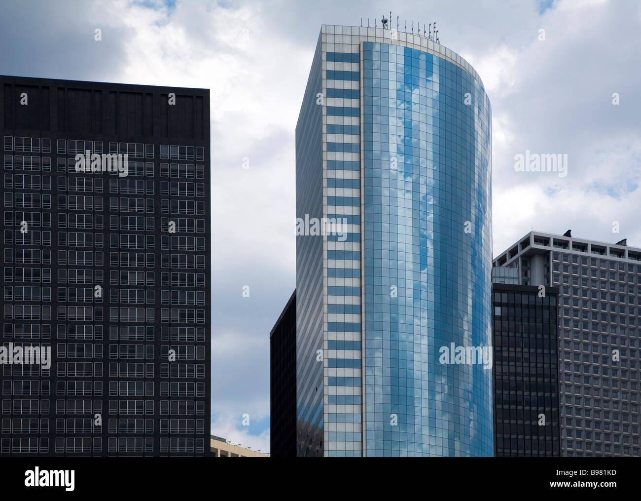 urban view at modern glass building with reflection on blue sky Stock ...