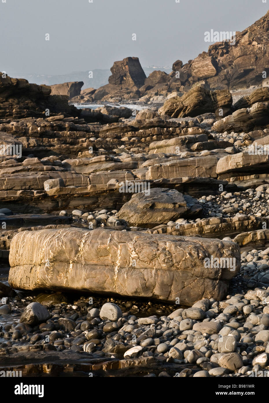 Rocks on the beach in Cornwall Stock Photo - Alamy