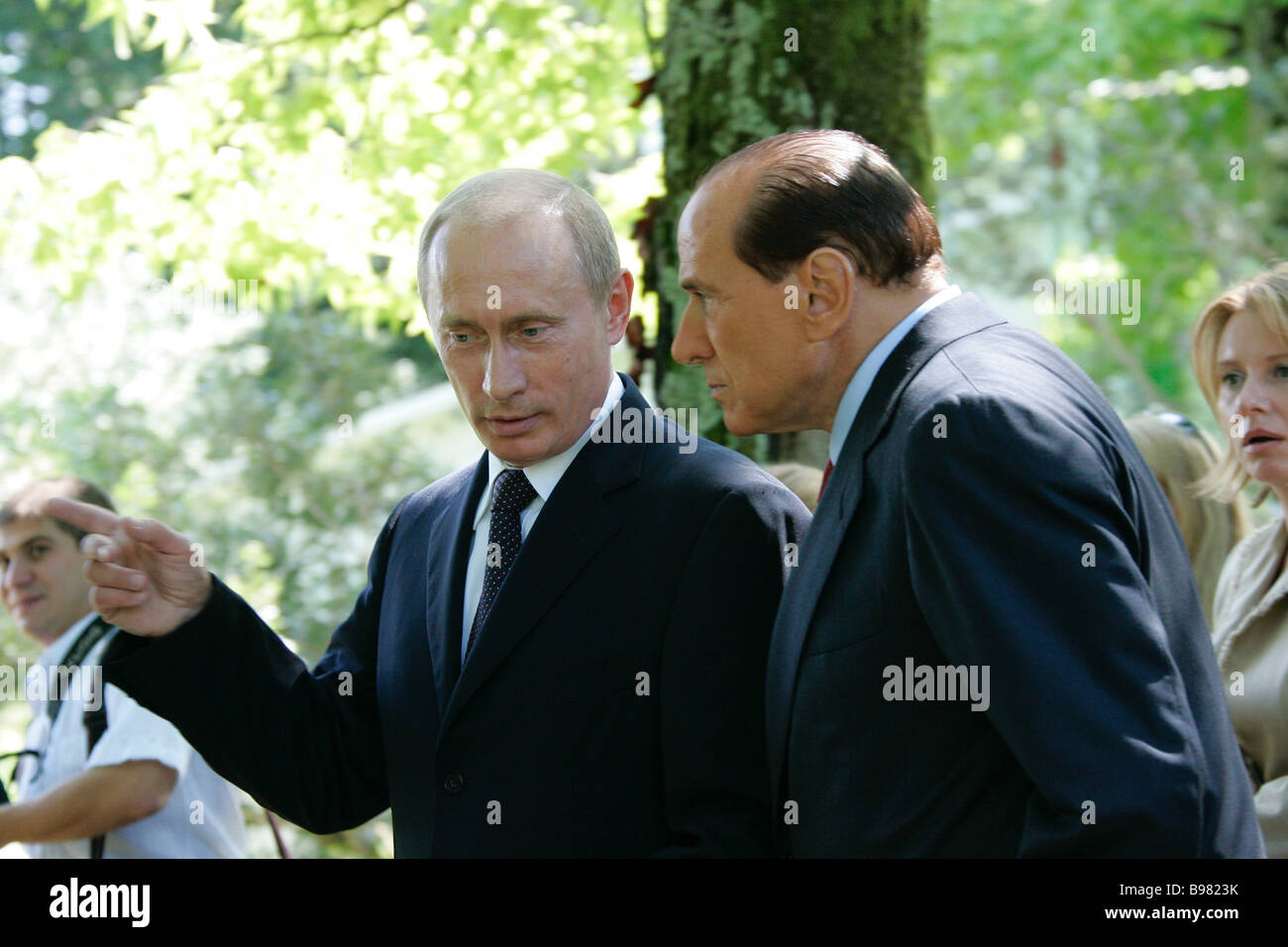 President Vladimir Putin left at a stroll with Italian Prime Minister ...