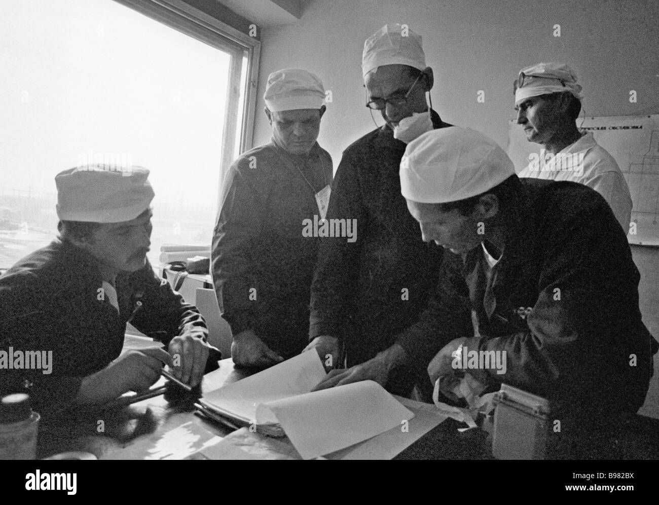 A group of physicists hold a meeting in one of the Chernobyl ...