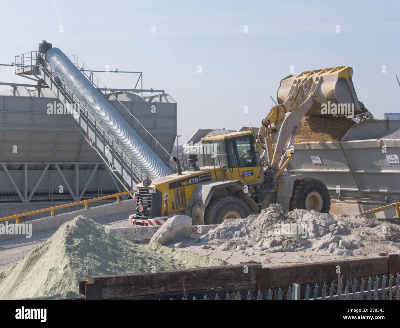 UK. WORKERS MIXING CEMENT FOR CONSTRUCTION OF OLYMPIC STADIUM.LONDON ...