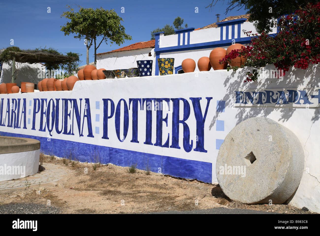 Colourful display at a traditional Algarve pottery workshop Terracotta ...