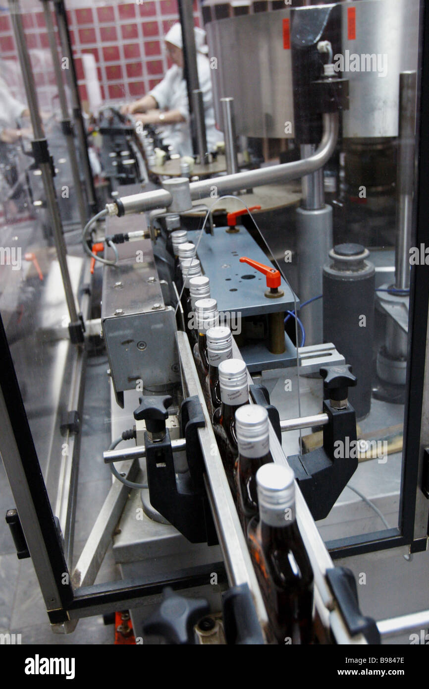 Conveyor line at the Derbent Brandy Combine Stock Photo - Alamy