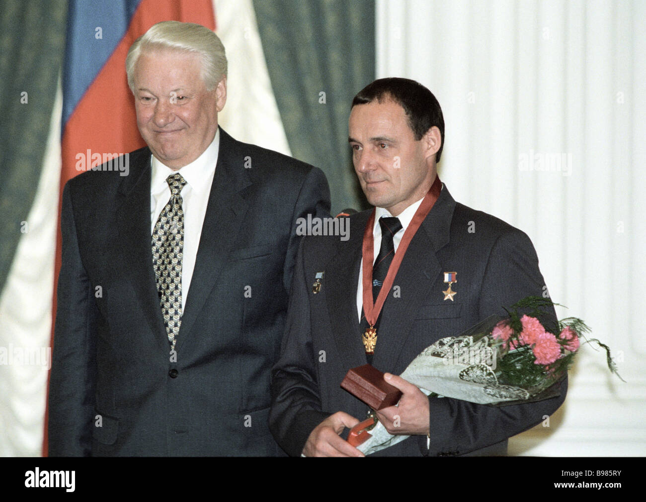 Russian President Boris Yeltsin left and test pilot Anatoly Kvochur who ...
