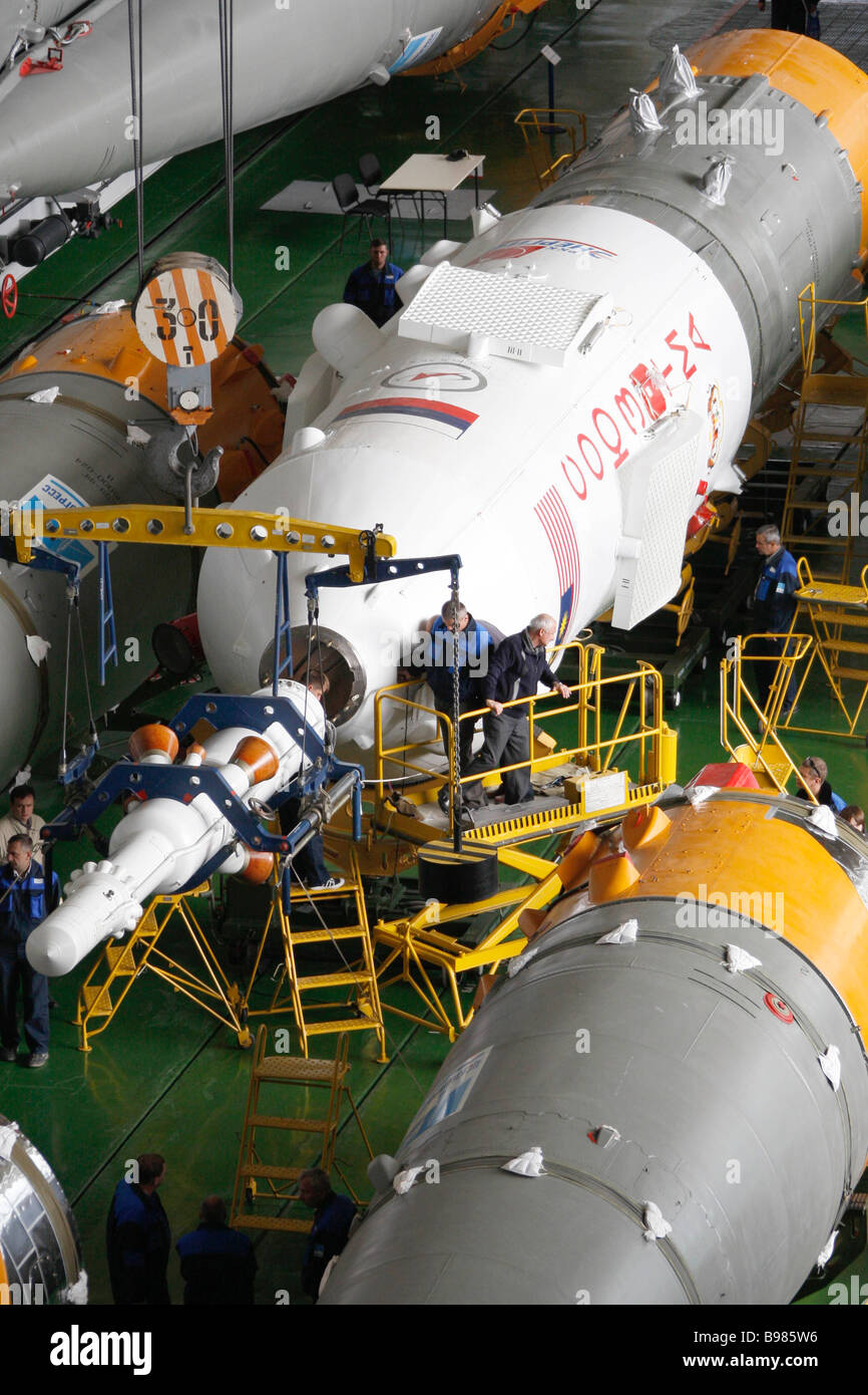 Installing the emergency recovery system on the Soyuz TMA 11 rocket in ...