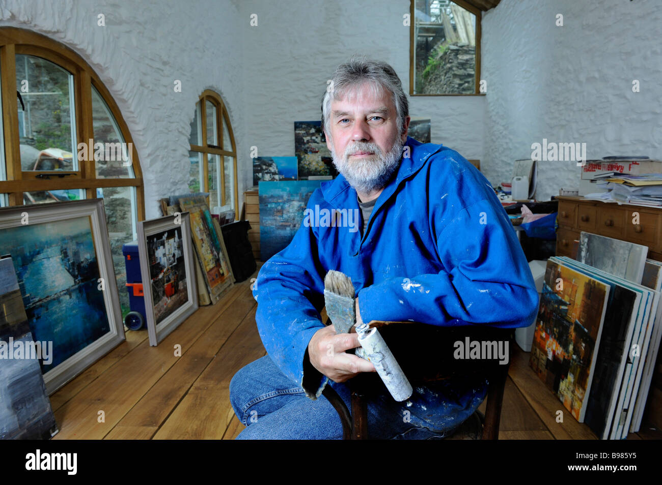 artist mike bernard in his studio nr Combe Martin Stock Photo - Alamy
