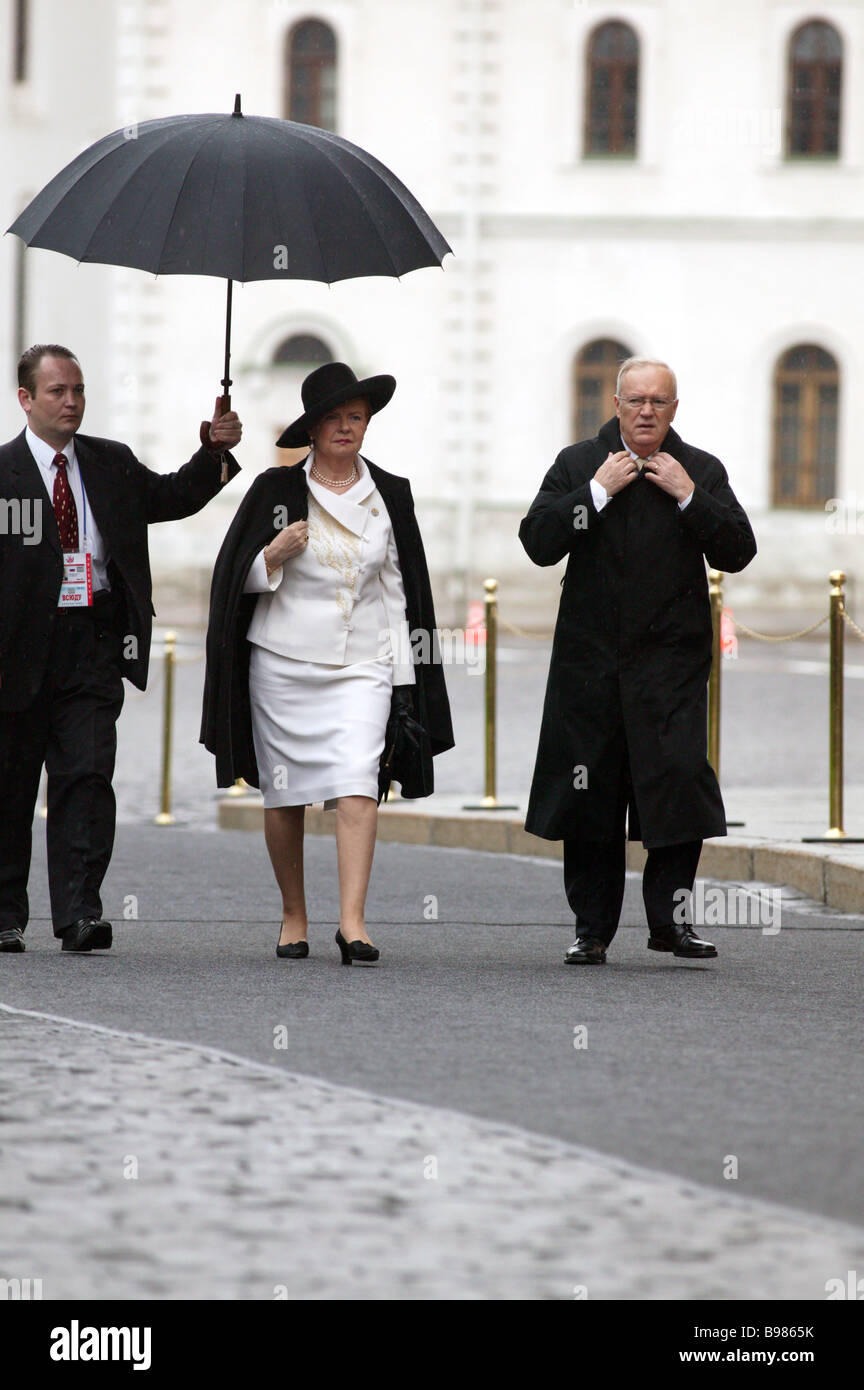 Latvia s President Vaira Vike Freiberga center and Imants Freibergs her ...