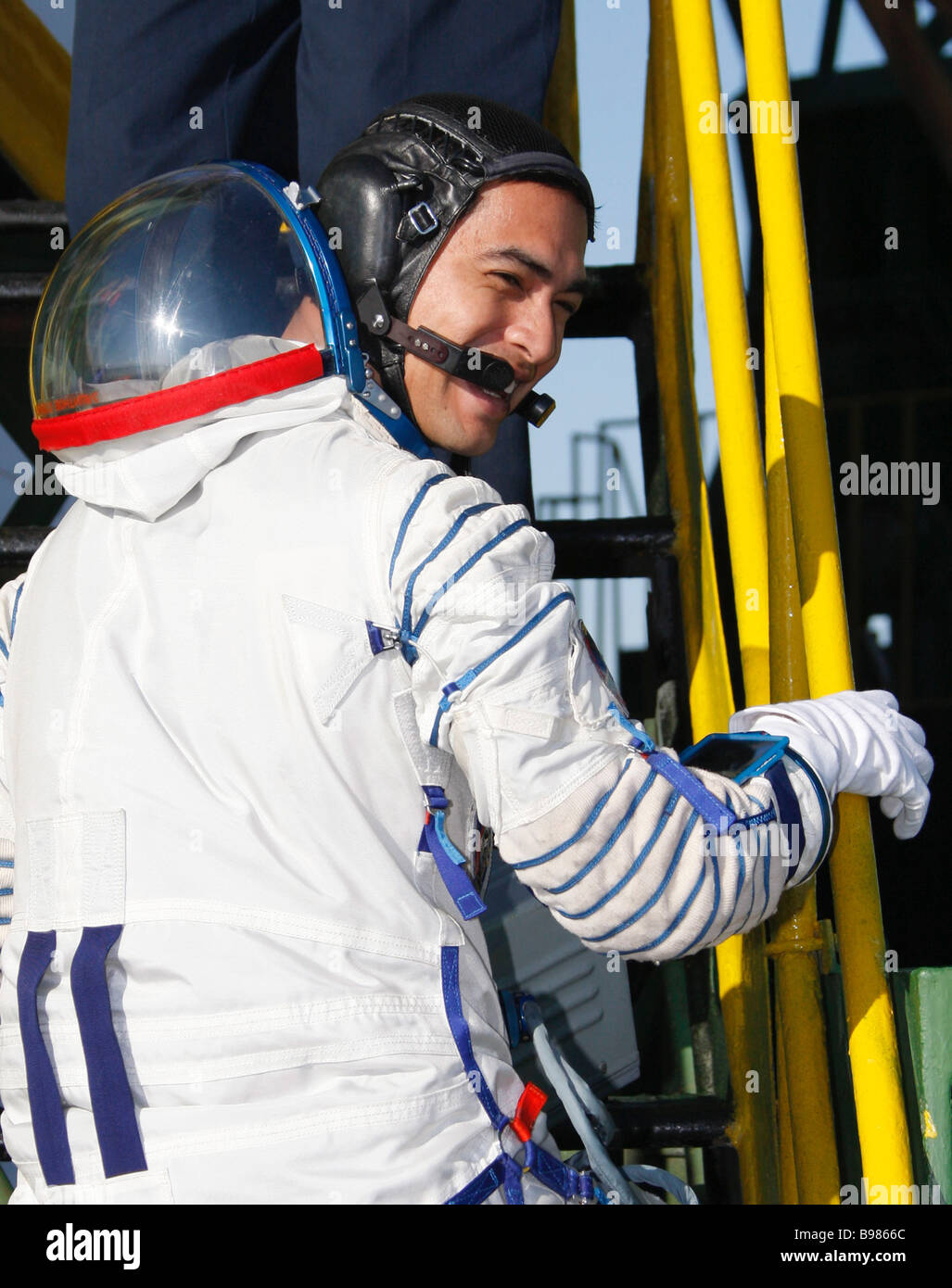 Malaysian astronaut Sheikh Muszaphar Shukor gets into the spacecraft in ...