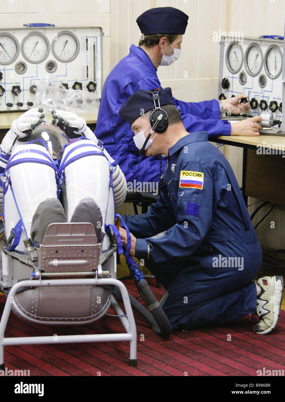 Malaysian astronaut Sheikh Muzaphar Shukor undergoes the check of ...