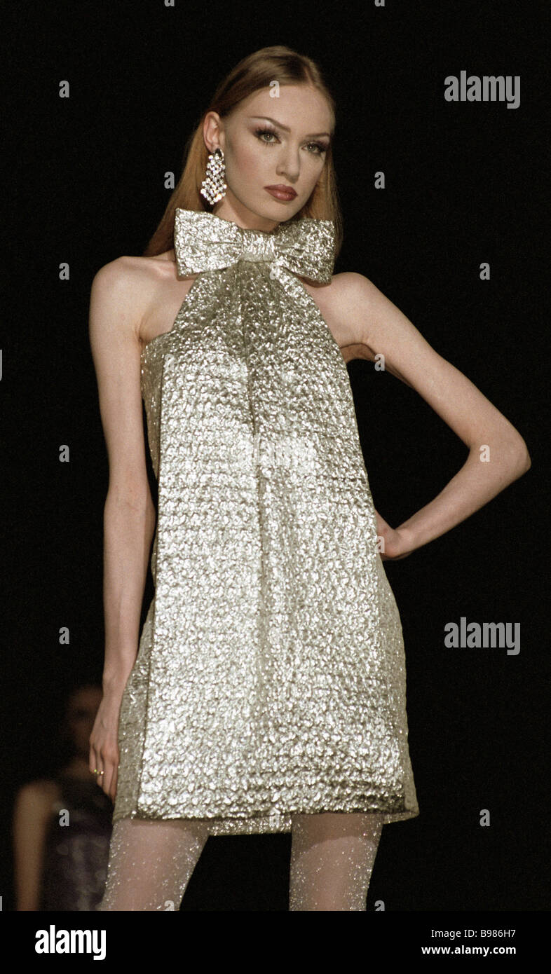 A model demonstrates a dress at the retrospective show of Pierre Cardin ...