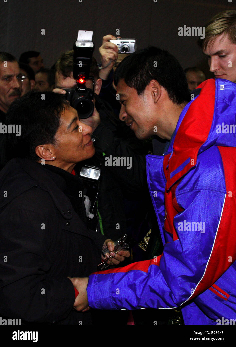 The first Malaysian astronaut Sheikh Muszaphar Shukor right member of ...