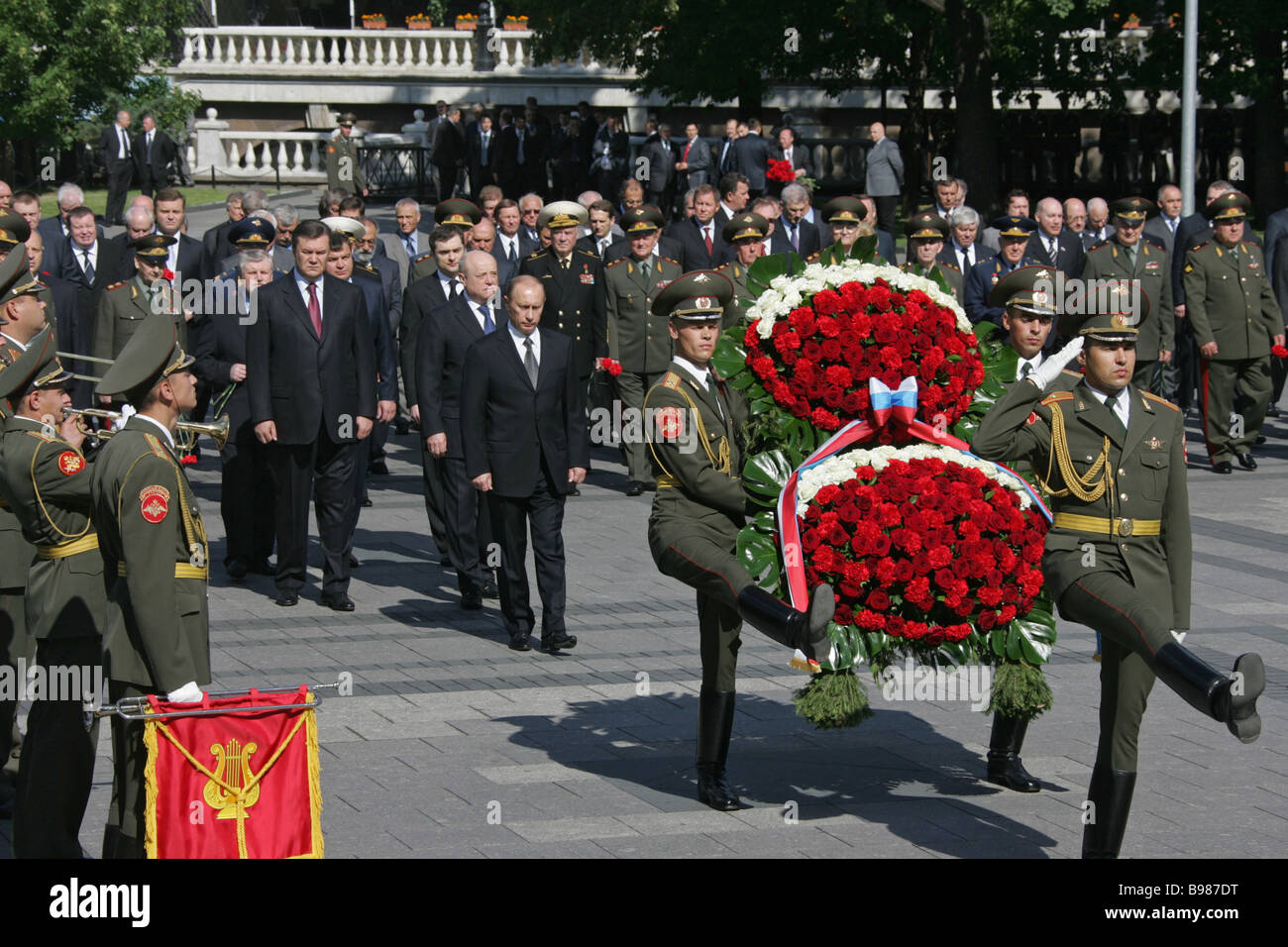 Russian President Vladimir Putin center during a ceremony for laying ...
