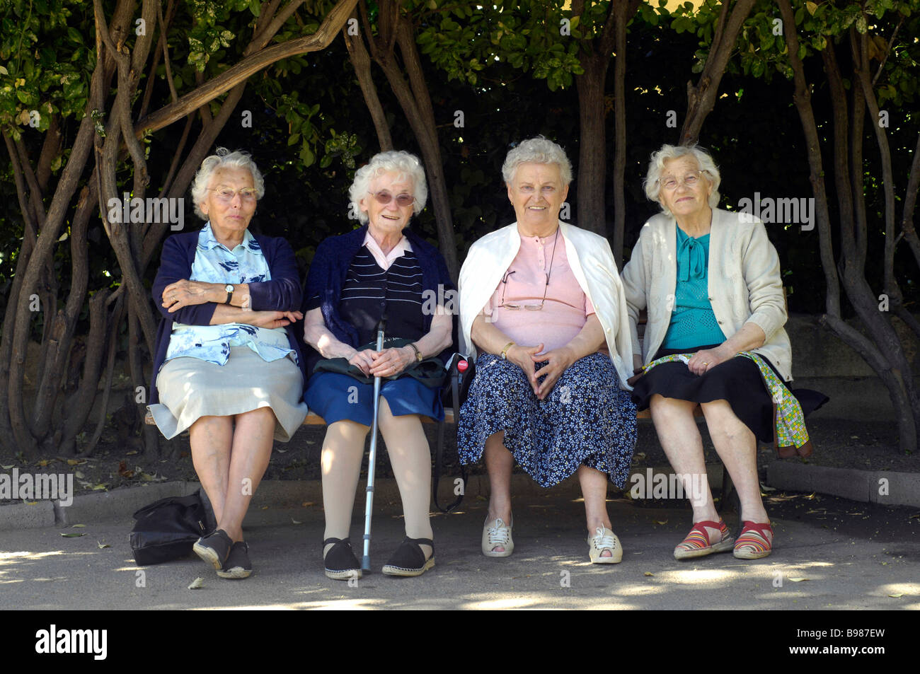 french oap ladies sit in the central park in pezenas, languedoc, france ...