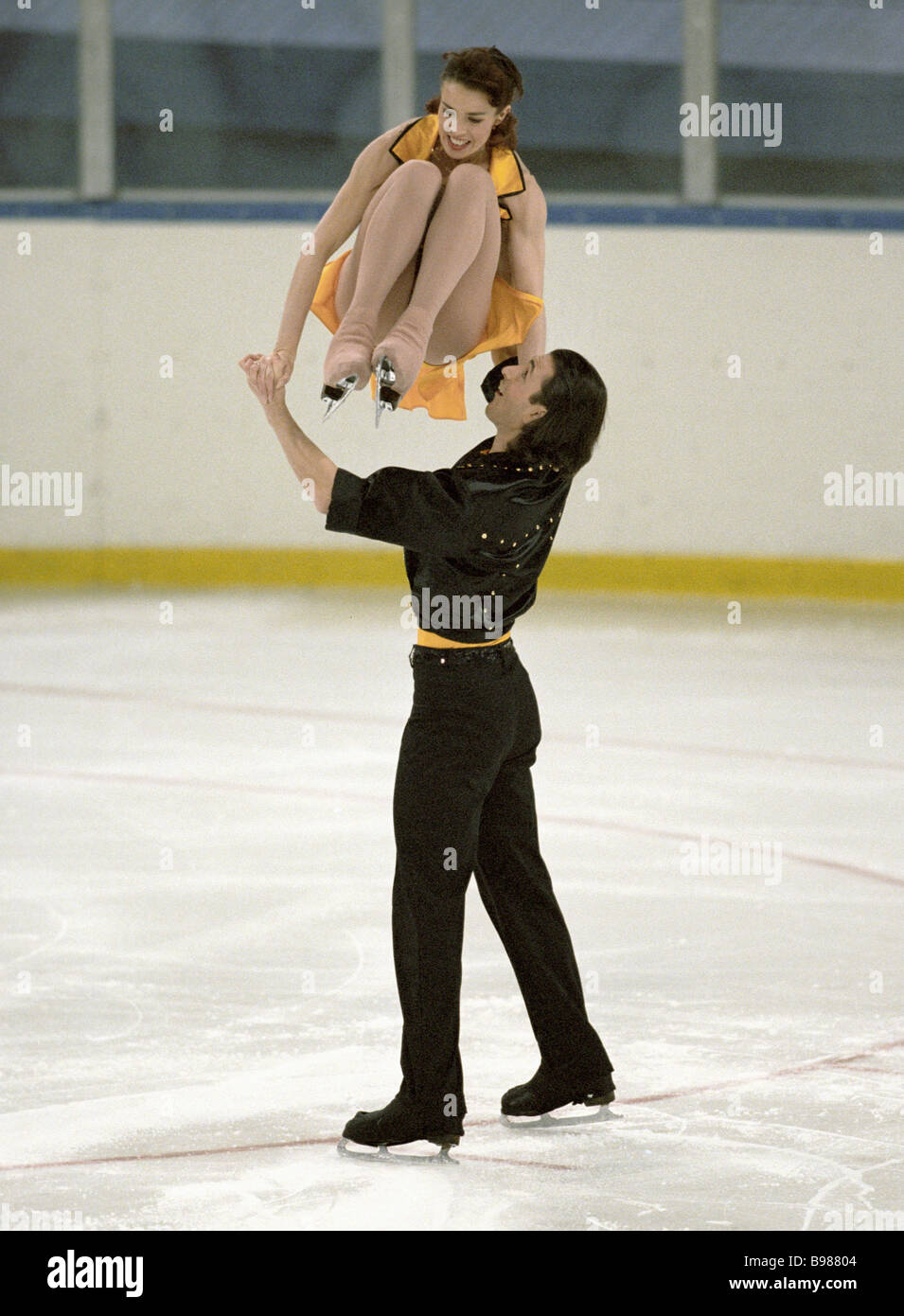 Figure skaters Irina Lobacheva left and Ilya Averbukh right contesting ...