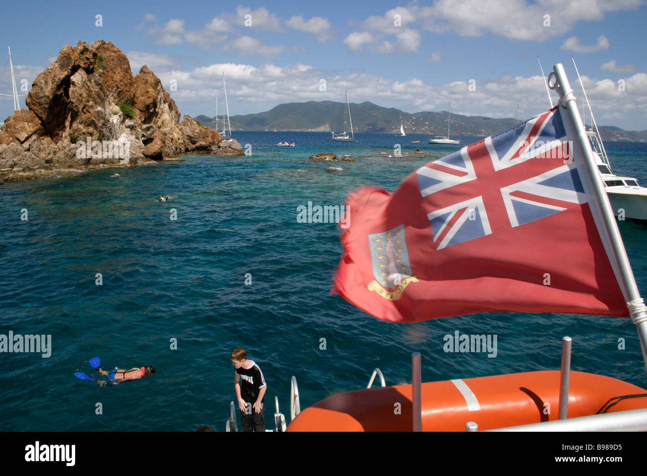 Nr Peter Island British Virgin Islands Large rock in sea view from boat ...