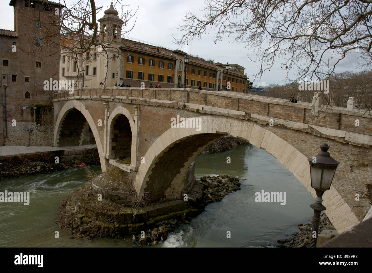 Isola Tiberina Island on the Tiber Stone bridge over river Two spans ...