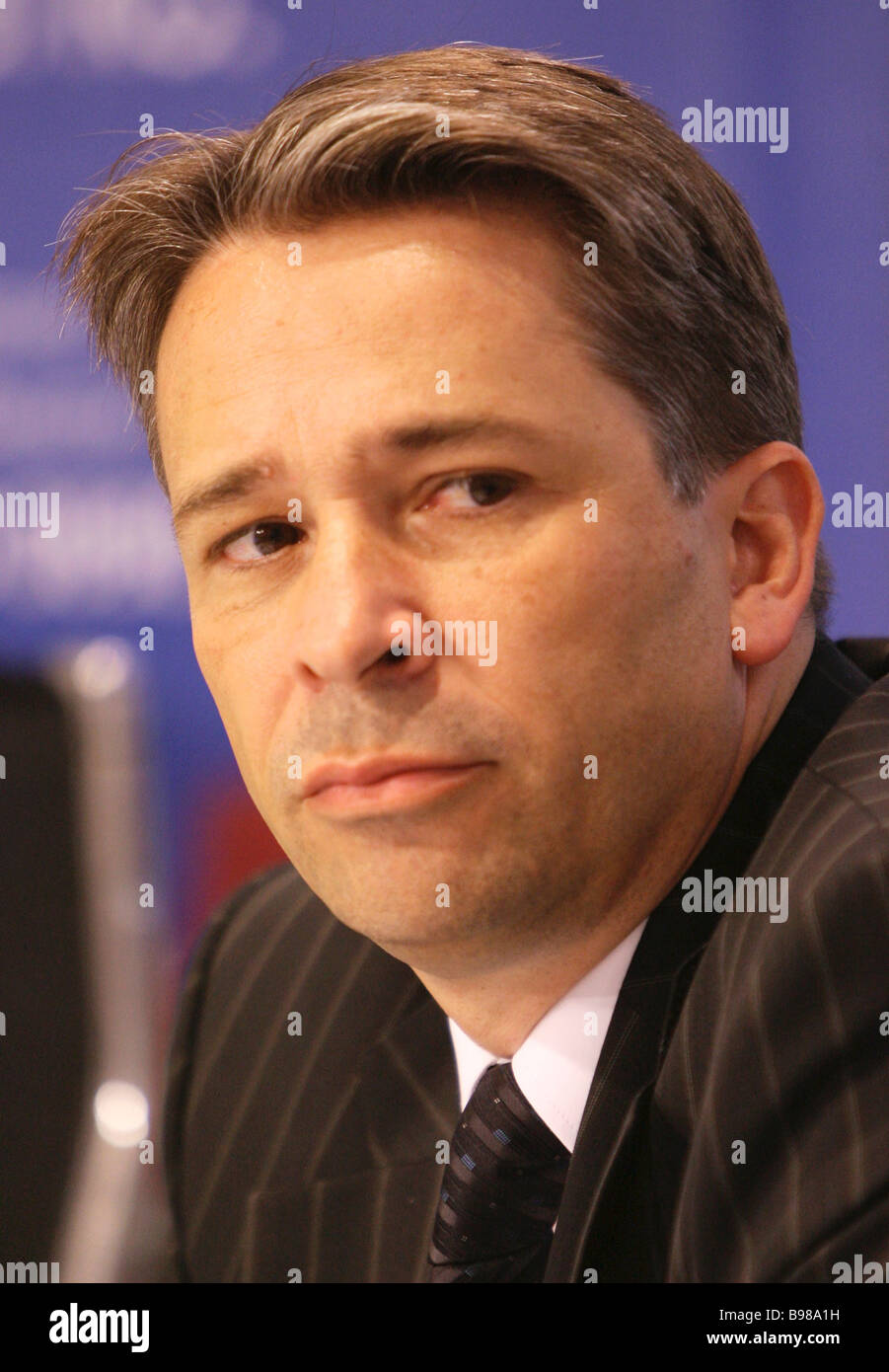 Richard Gaskin president of GE Money Bank JSC at a news conference in ...