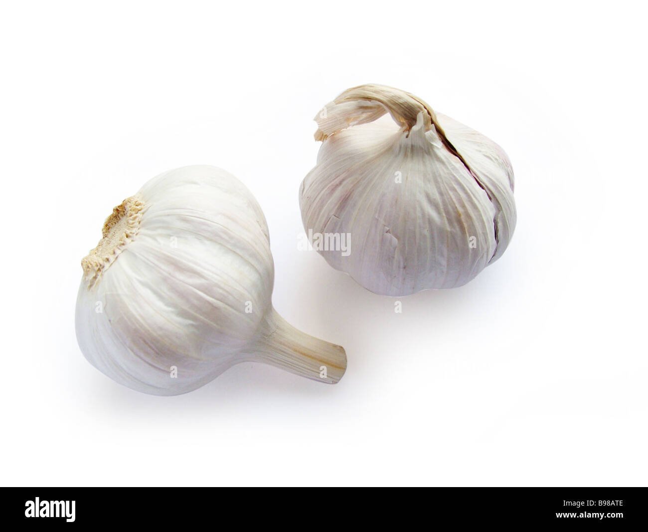 Two cloves garlic Cut Out Stock Images & Pictures - Alamy
