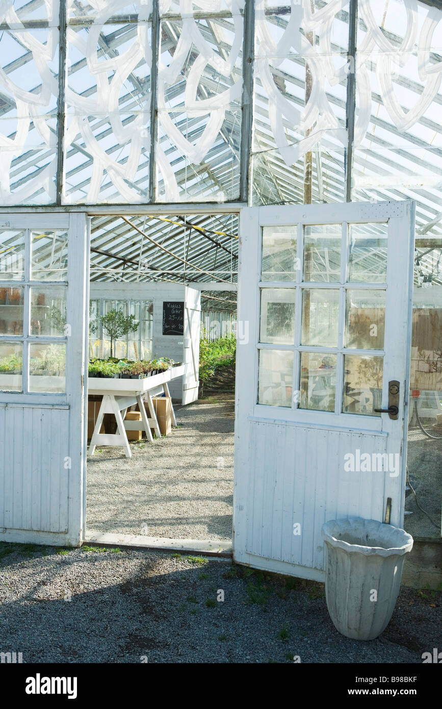 Greenhouse, view of interior through door Stock Photo - Alamy