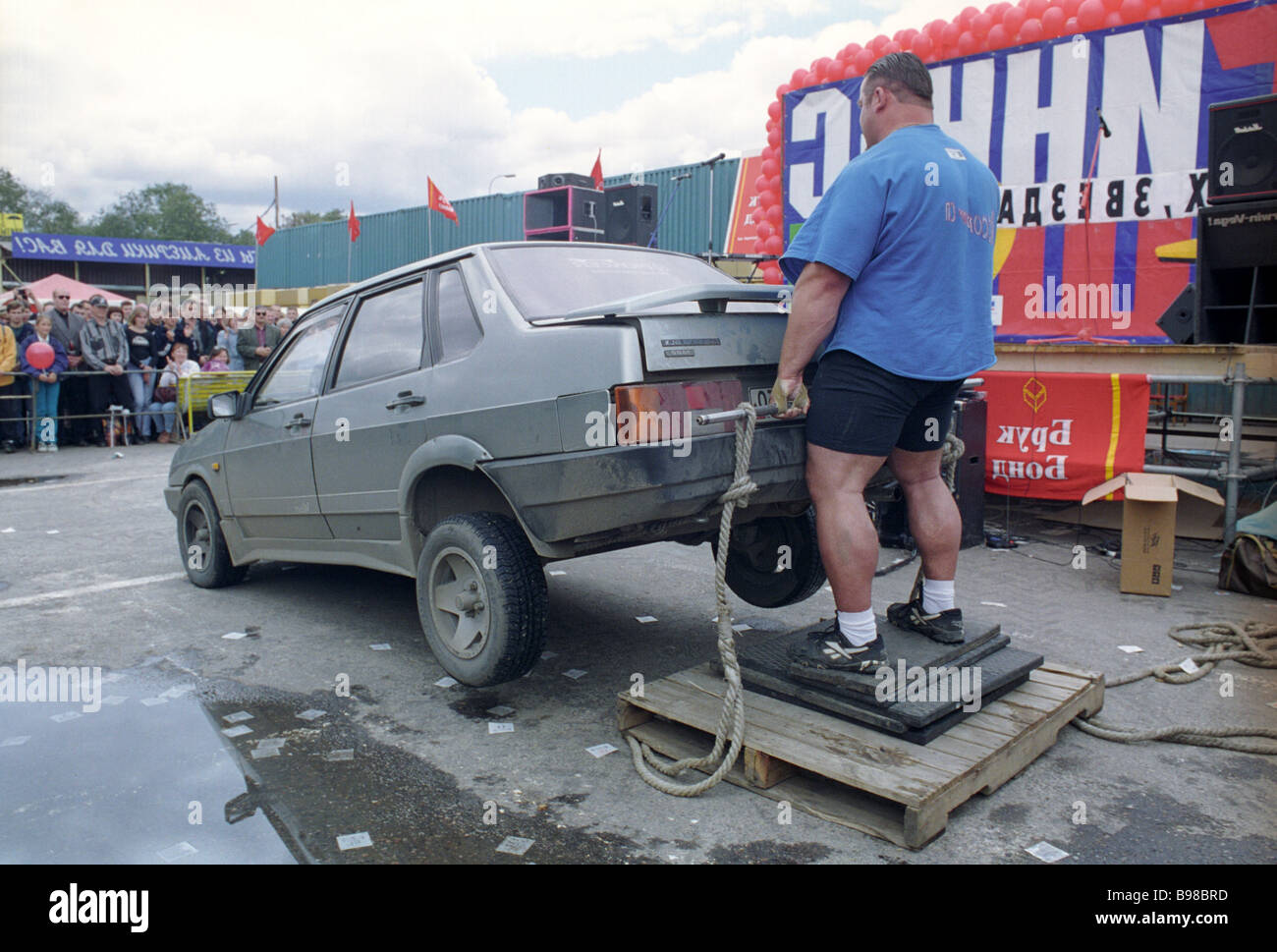 Alexander Matveyev the strongest man in Russia easily lifts a car Stock ...